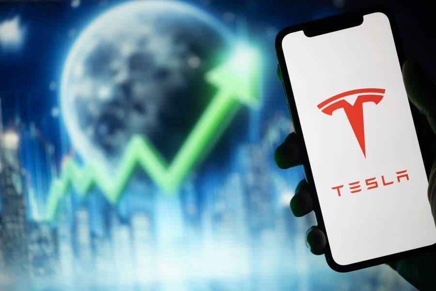 Tesla shares hit a record high, fueled by strong optimism about ...